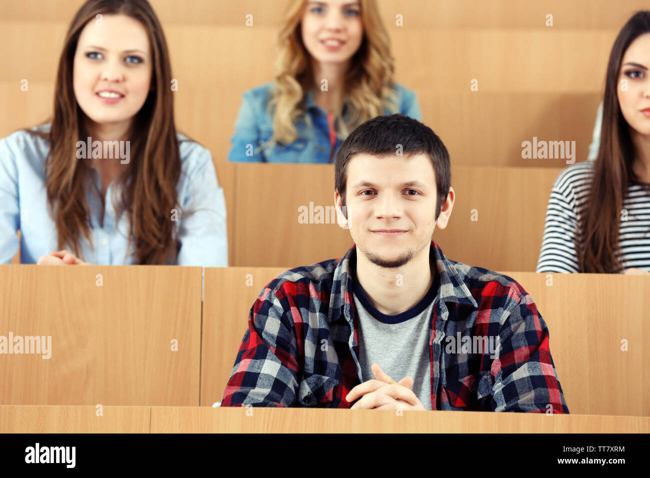 Group of students sitting in classroom Stock Photo - Alamy