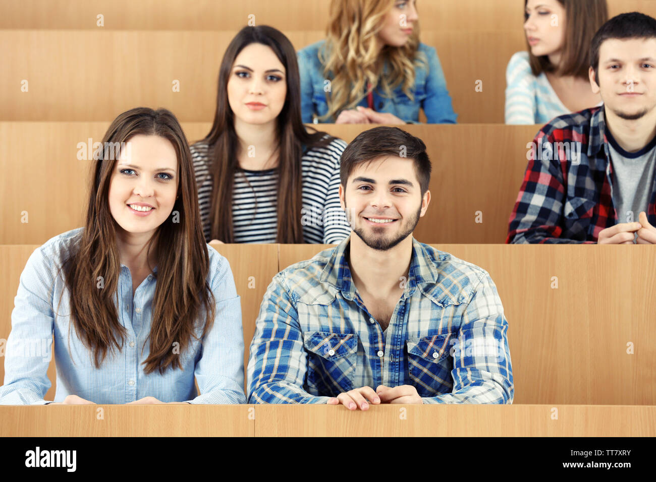 Group of students sitting in classroom Stock Photo - Alamy