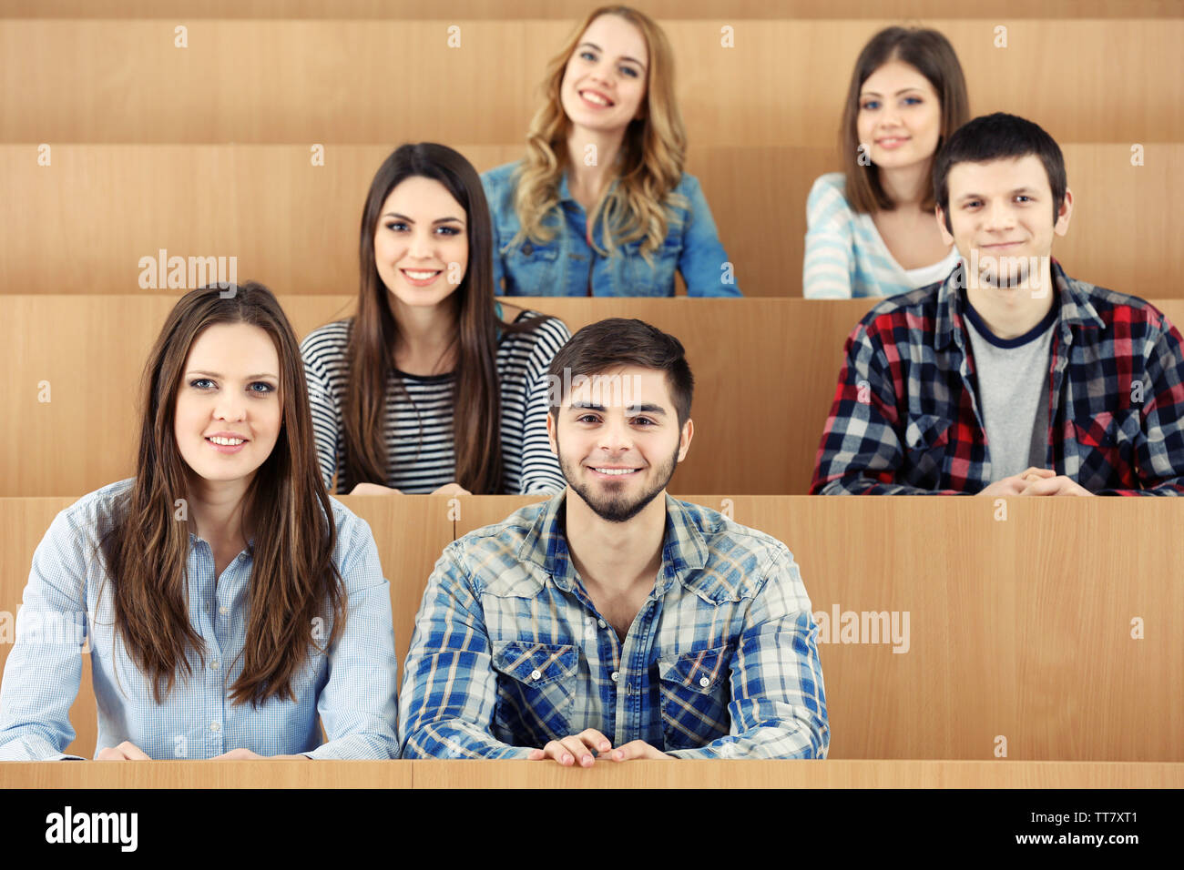 Group of students sitting in classroom Stock Photo - Alamy