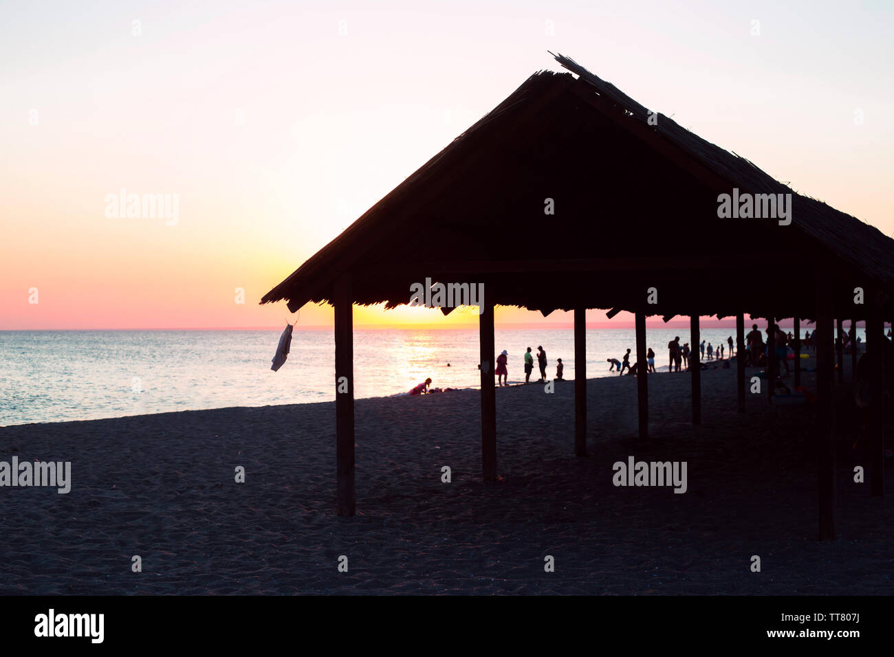 Old canopy to create shade on the beach by the sea in Crimea. Summer ...