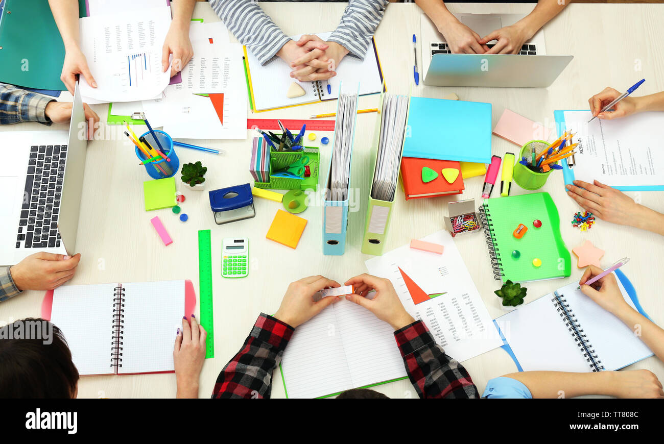 Group of people working at desk top view Stock Photo - Alamy