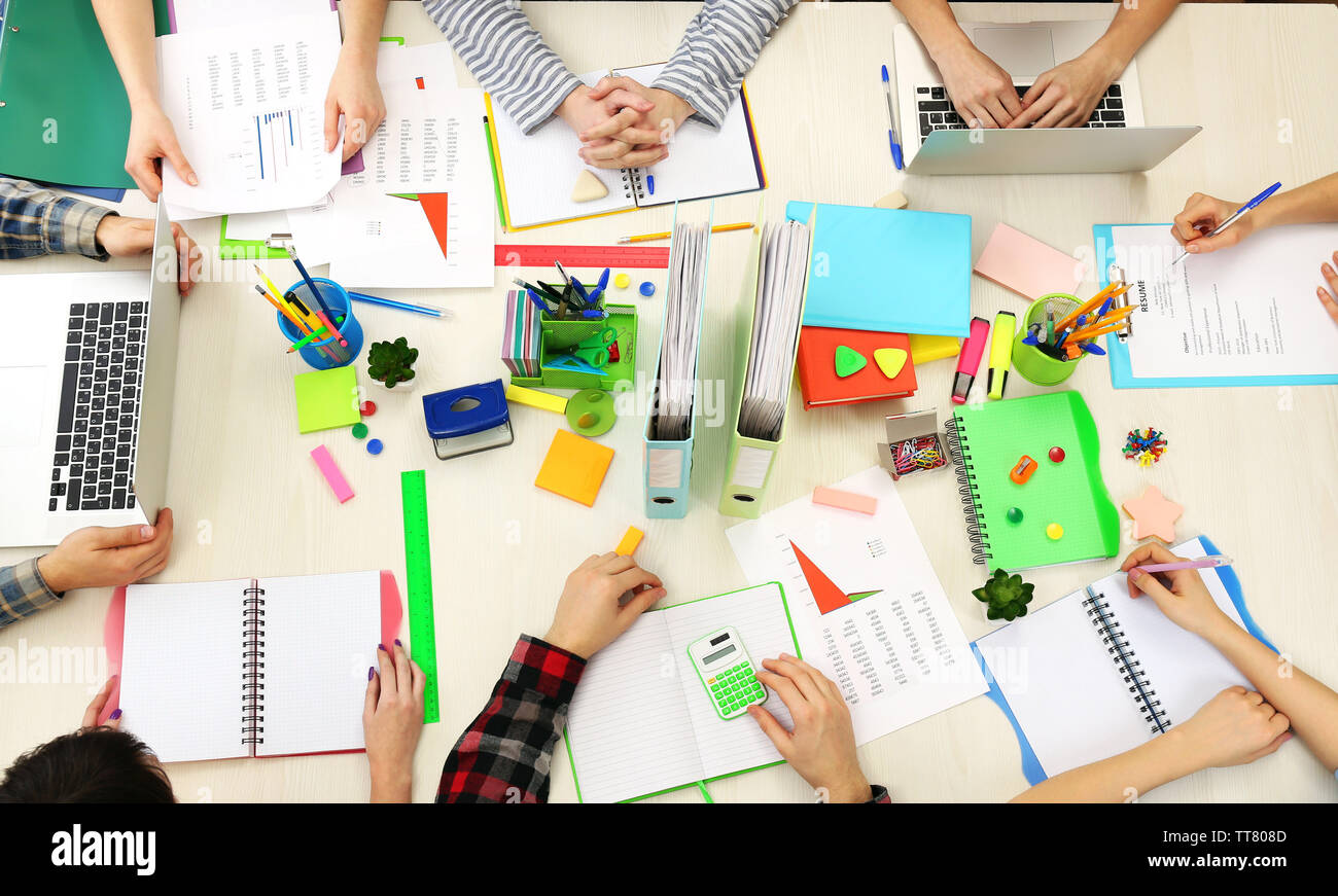 Group of people working at desk top view Stock Photo - Alamy
