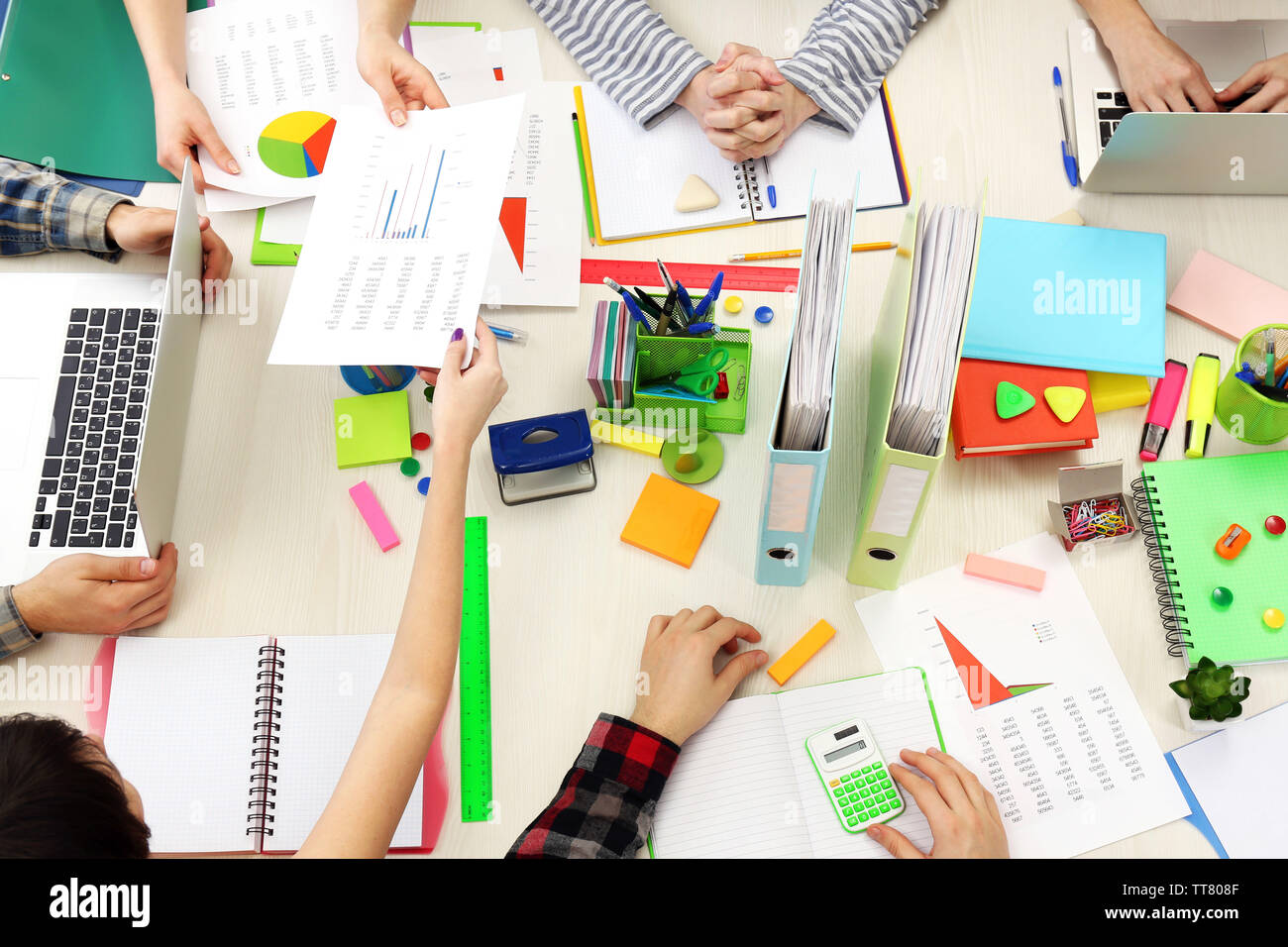 Group of people working at desk top view Stock Photo - Alamy