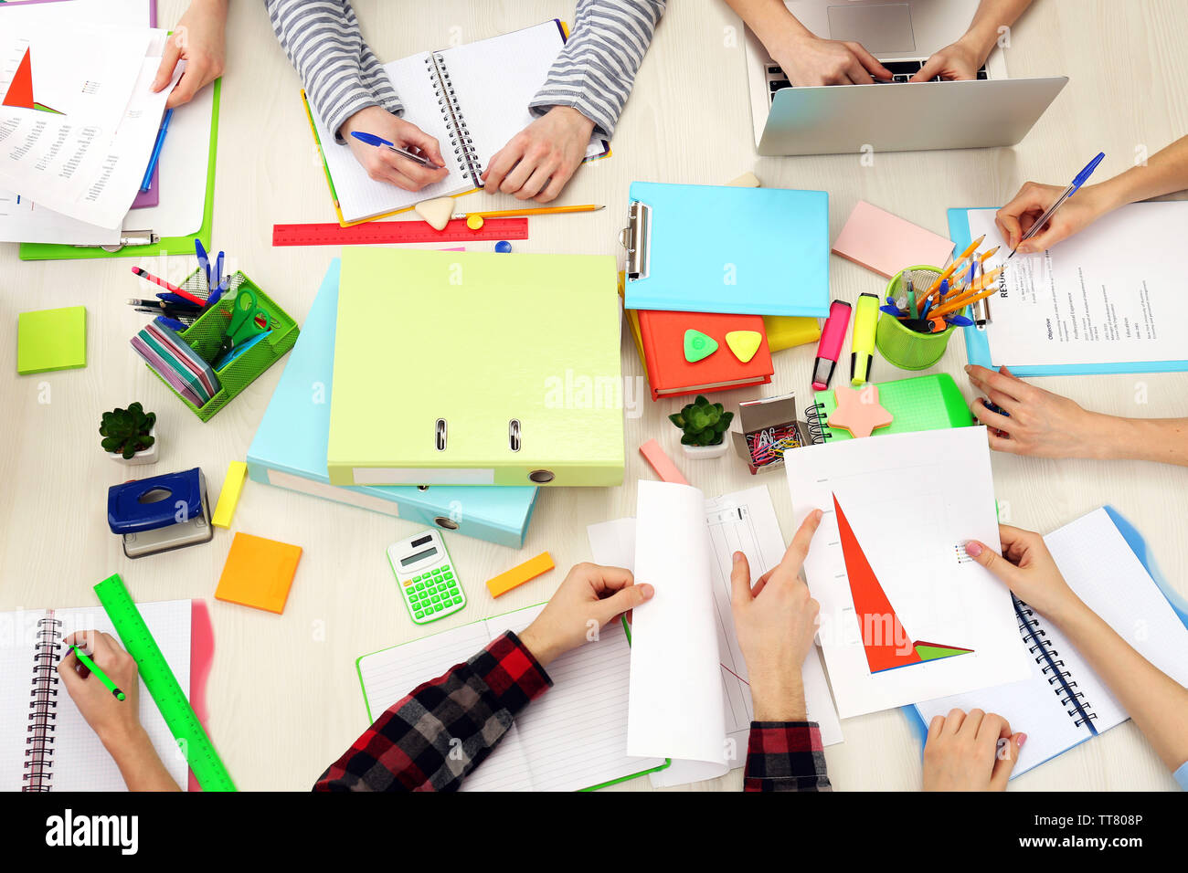 Group of people working at desk top view Stock Photo - Alamy