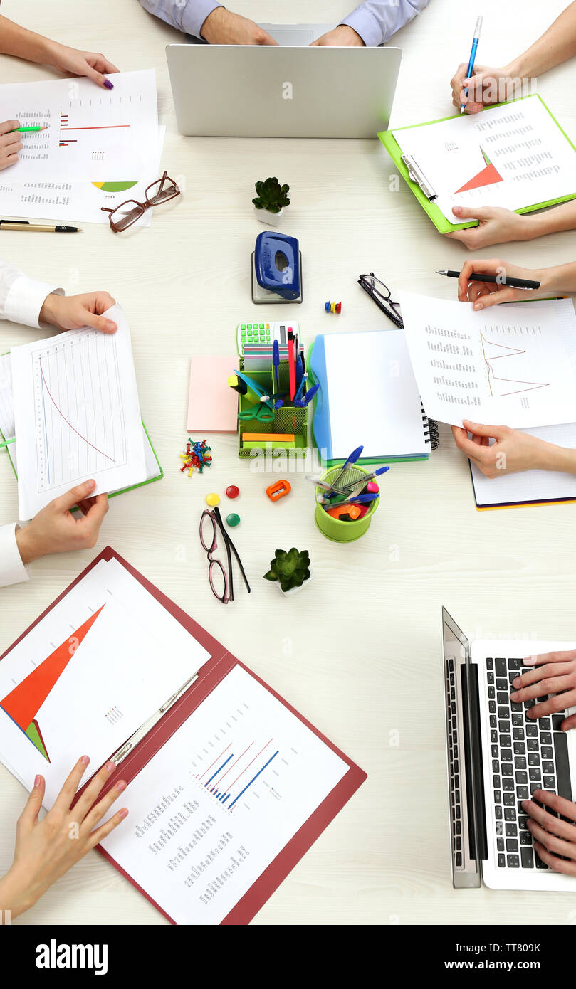 Group of people working at desk top view Stock Photo - Alamy