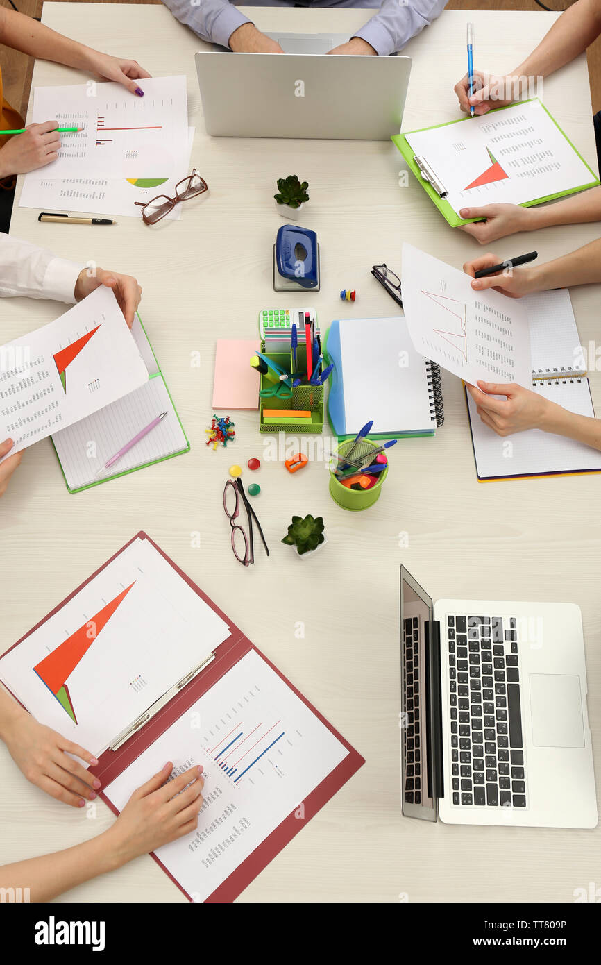 Group of people working at desk top view Stock Photo - Alamy