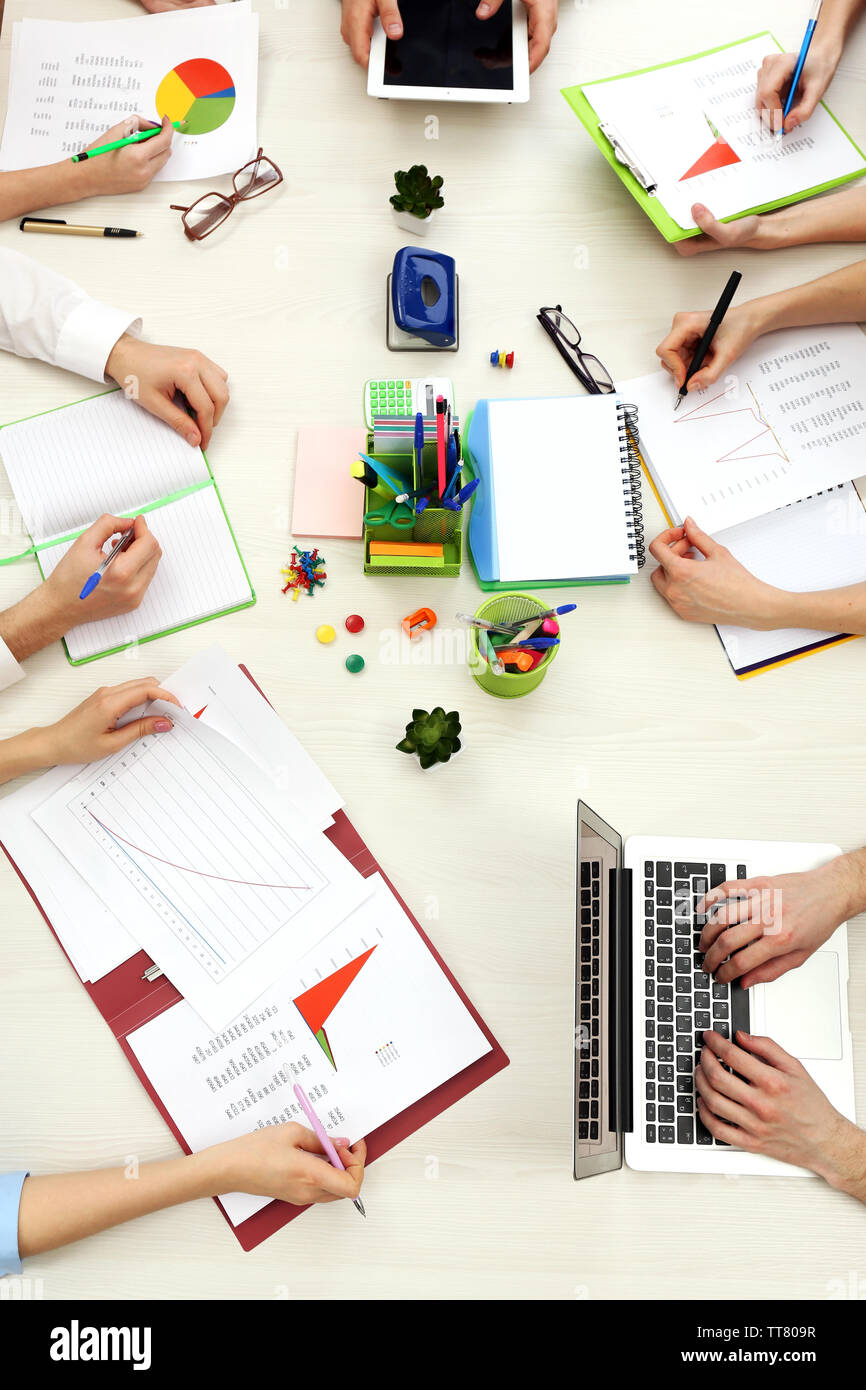 Group of people working at desk top view Stock Photo - Alamy