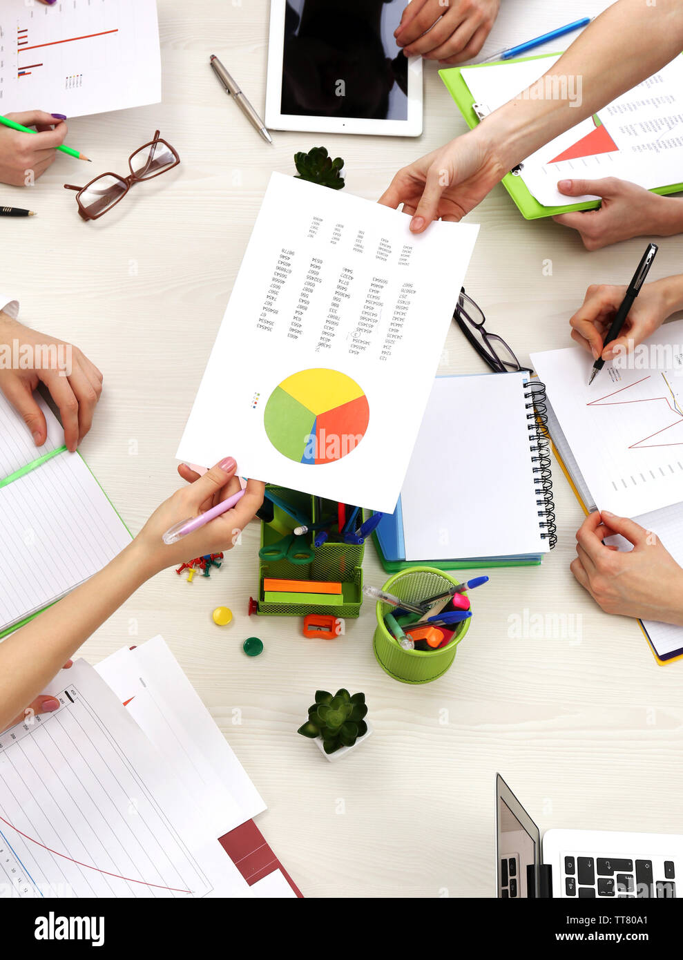 Group of people working at desk top view Stock Photo - Alamy
