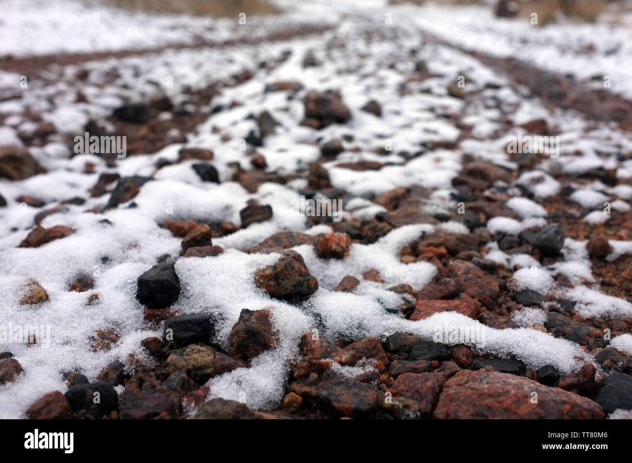 Many stones covered with snow Stock Photo - Alamy