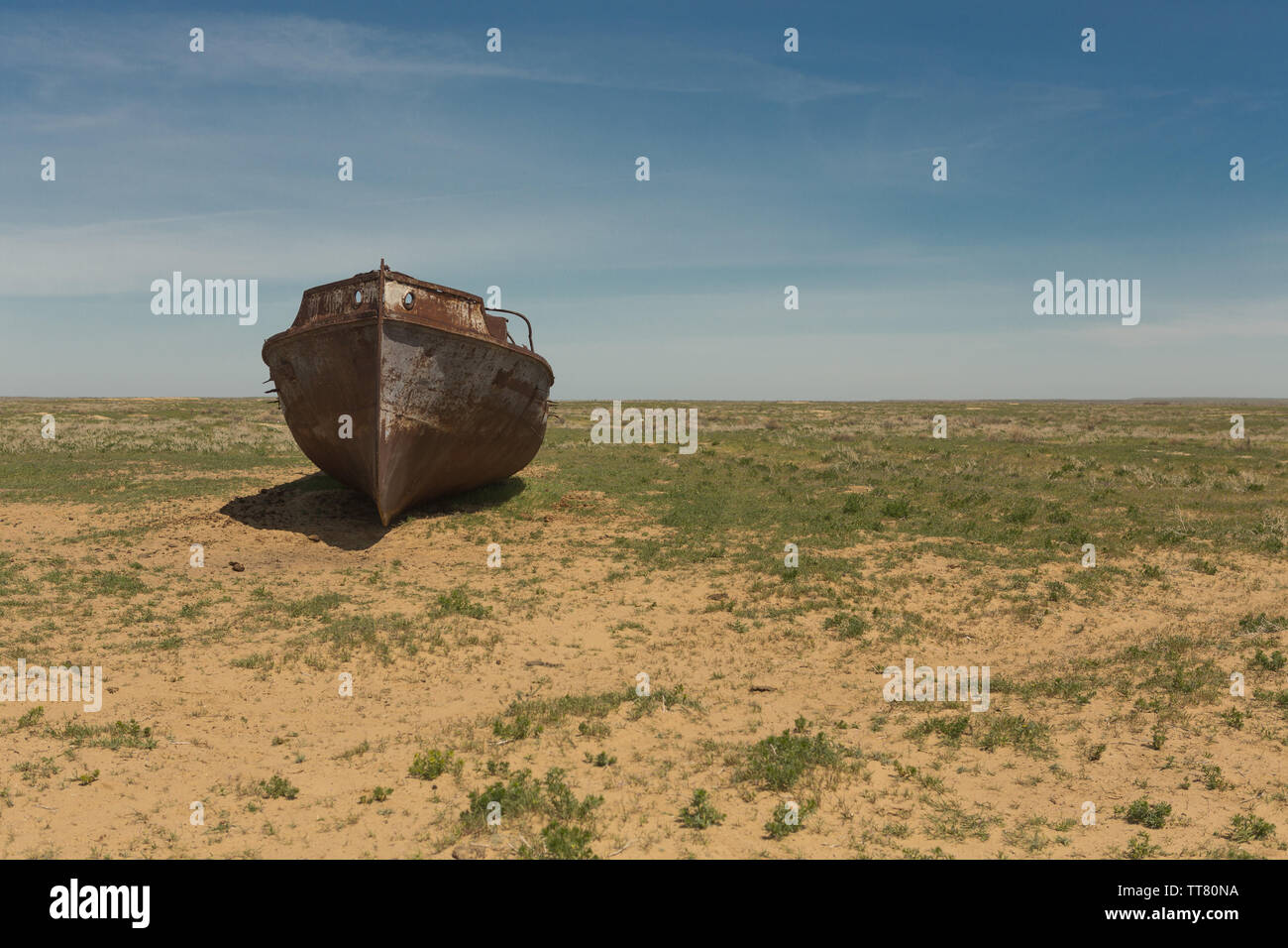 Old boat on dry land Stock Photo - Alamy