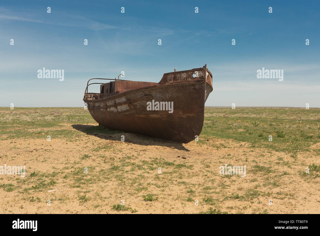 Old boat on dry land Stock Photo - Alamy