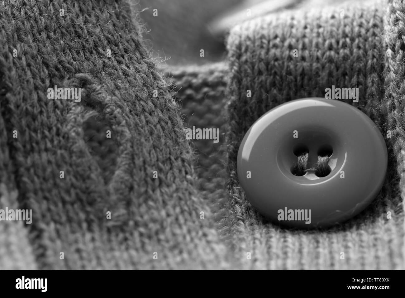 Button on clothes close up Stock Photo - Alamy