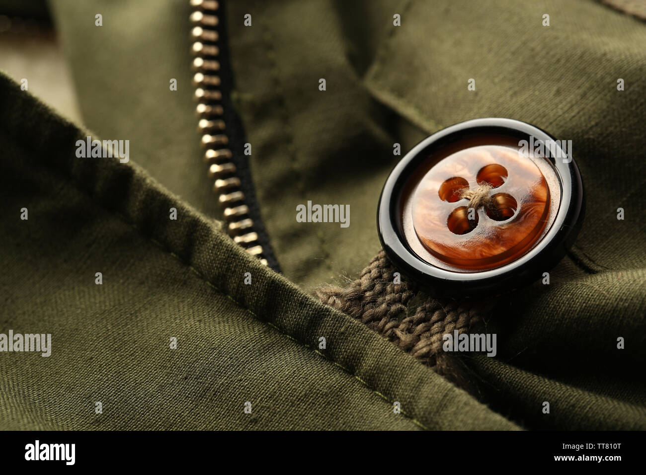 Button on clothes close up Stock Photo - Alamy