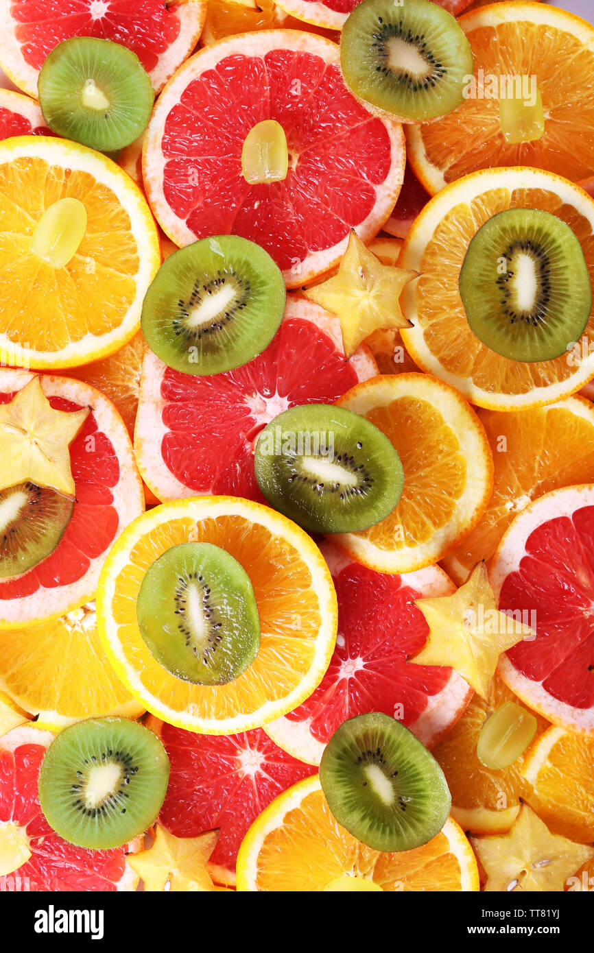 Sliced fruits background Stock Photo - Alamy