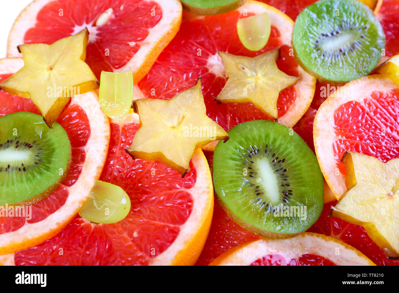 Sliced fruits background Stock Photo - Alamy