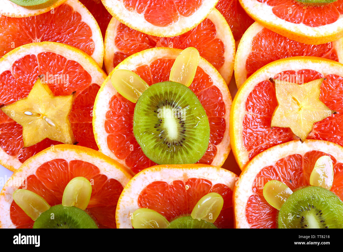 Sliced fruits background Stock Photo - Alamy