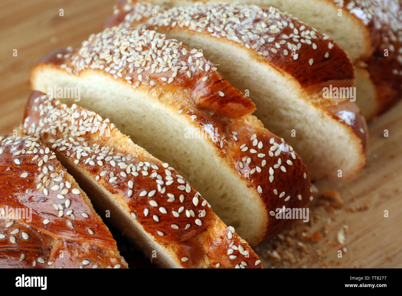 Sliced fresh bun on wooden background Stock Photo - Alamy