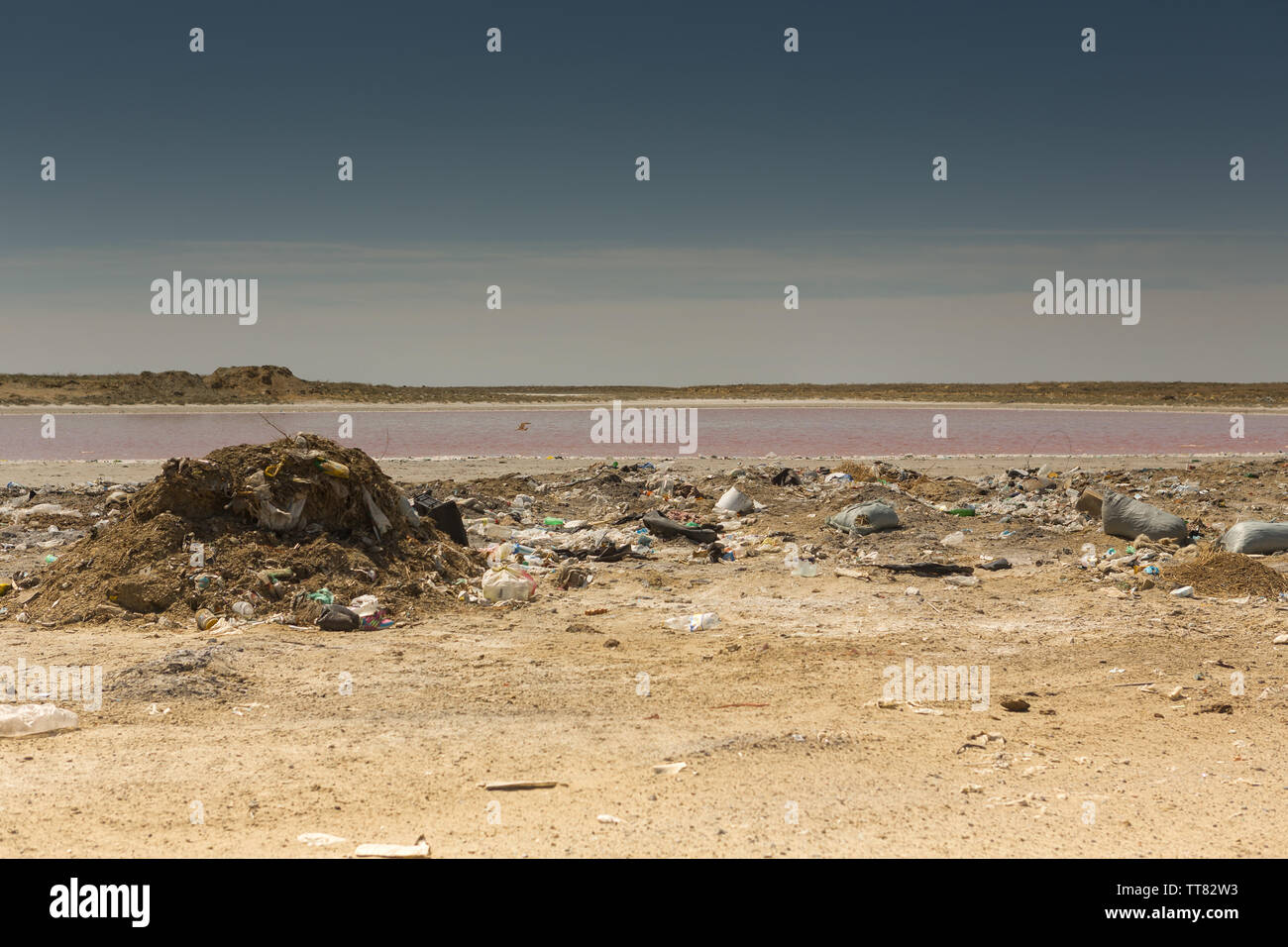 Illegal garbage dump near the water Stock Photo - Alamy