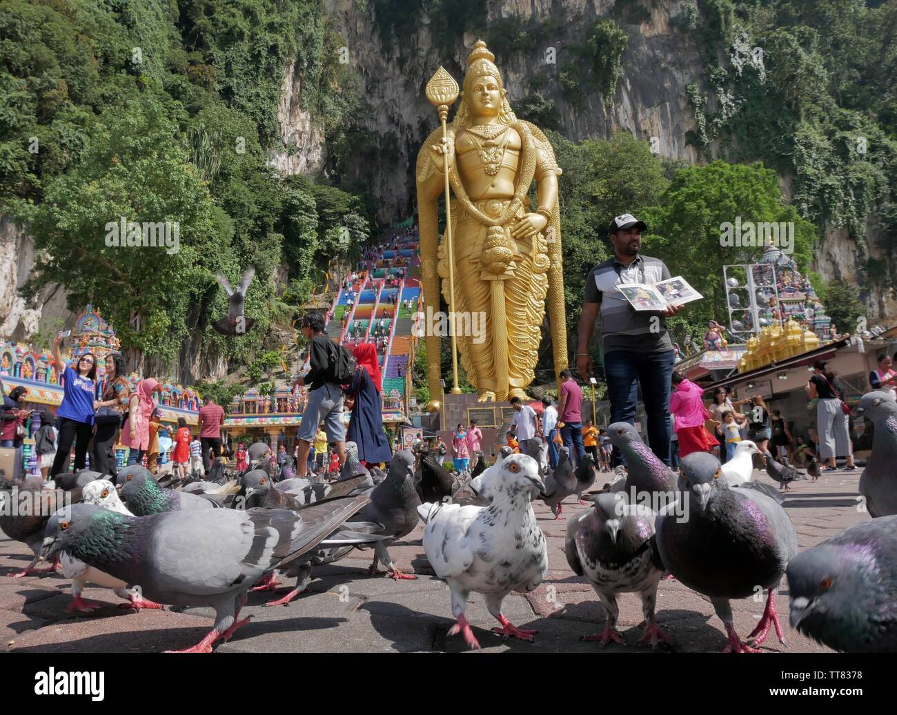 Batu Caves is a Malaysian tourism destination. It is a limestone hill ...