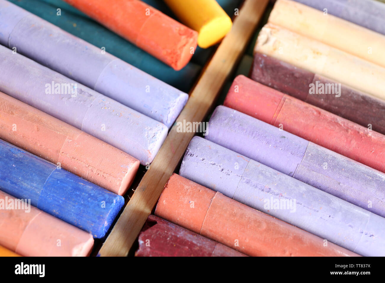 Colorful chalk pastels in box close up Stock Photo - Alamy