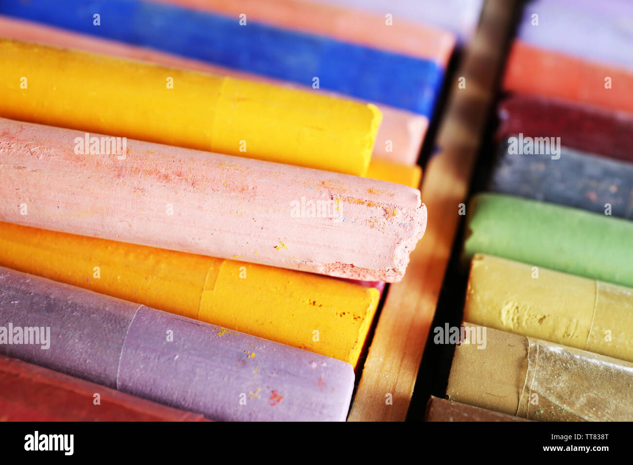 Colorful chalk pastels in box close up Stock Photo - Alamy