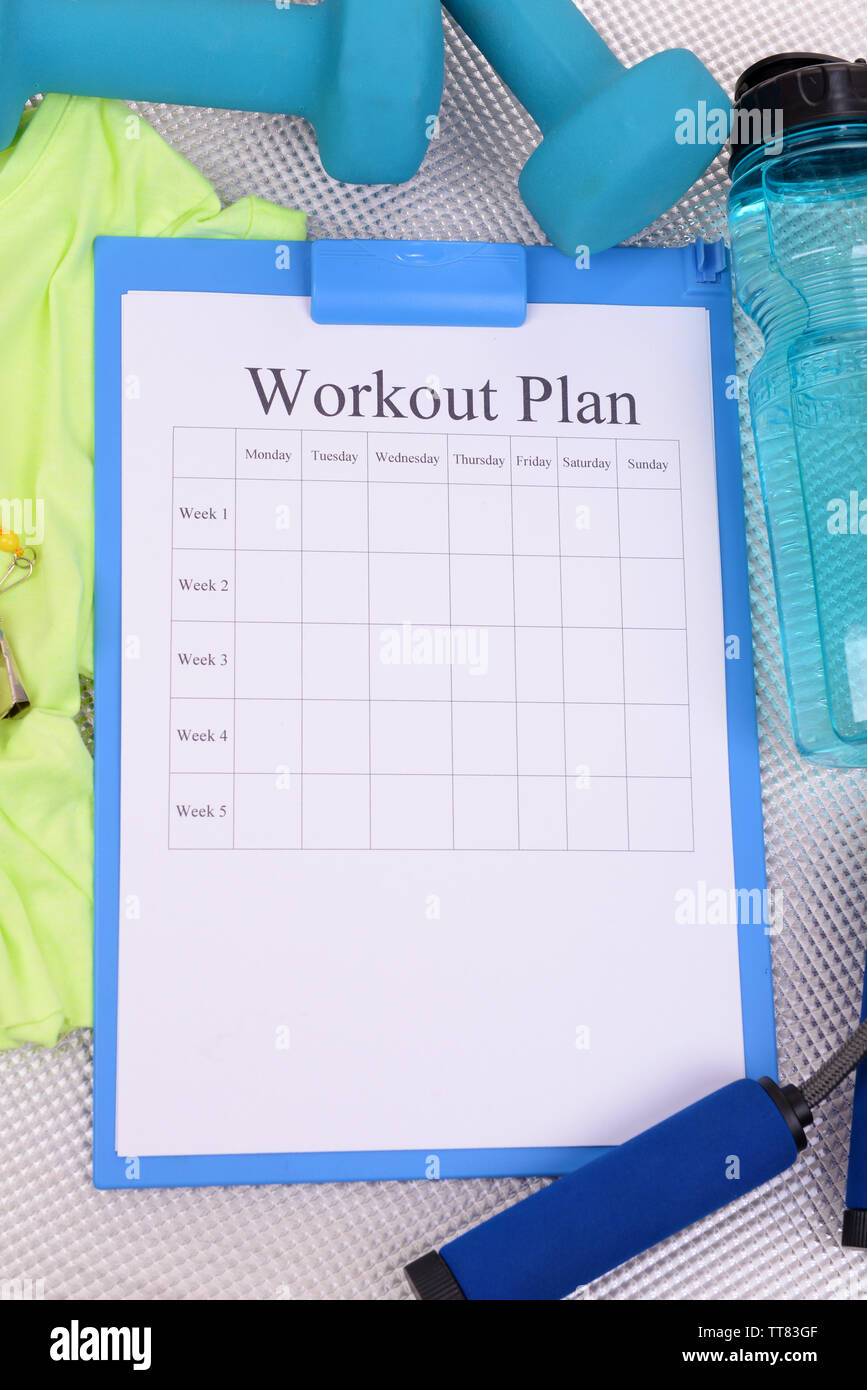 Workout plan and sports equipment top view close-up Stock Photo - Alamy