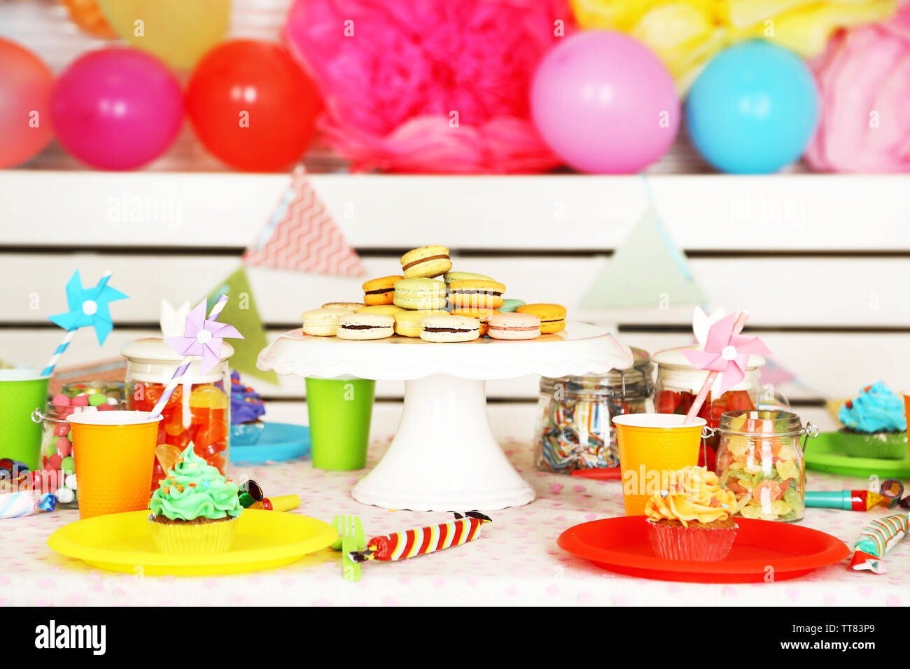 Prepared birthday table with sweets for children party Stock Photo - Alamy