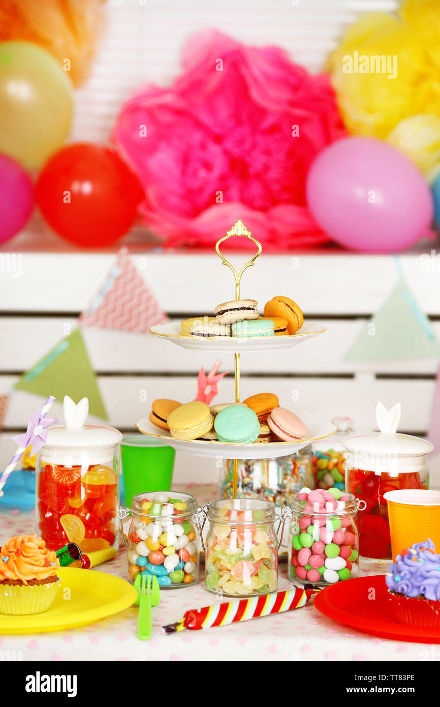 Prepared birthday table with sweets for children party Stock Photo - Alamy