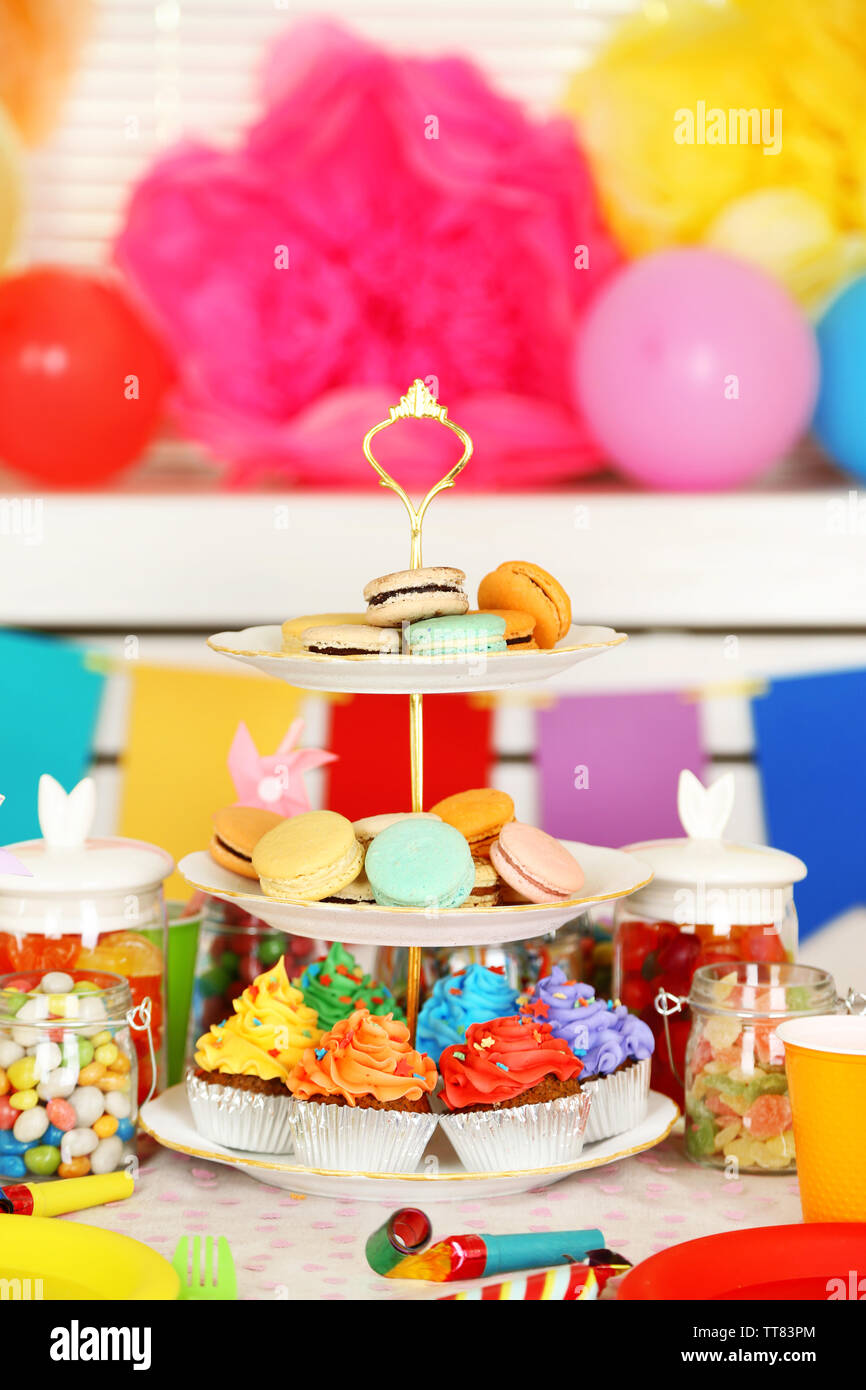Prepared birthday table with sweets for children party Stock Photo - Alamy