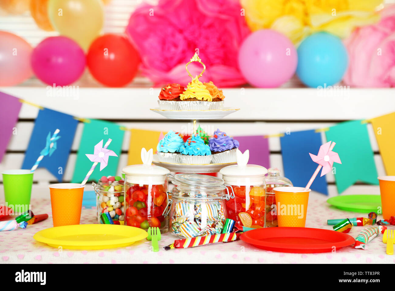 Prepared birthday table with sweets for children party Stock Photo - Alamy