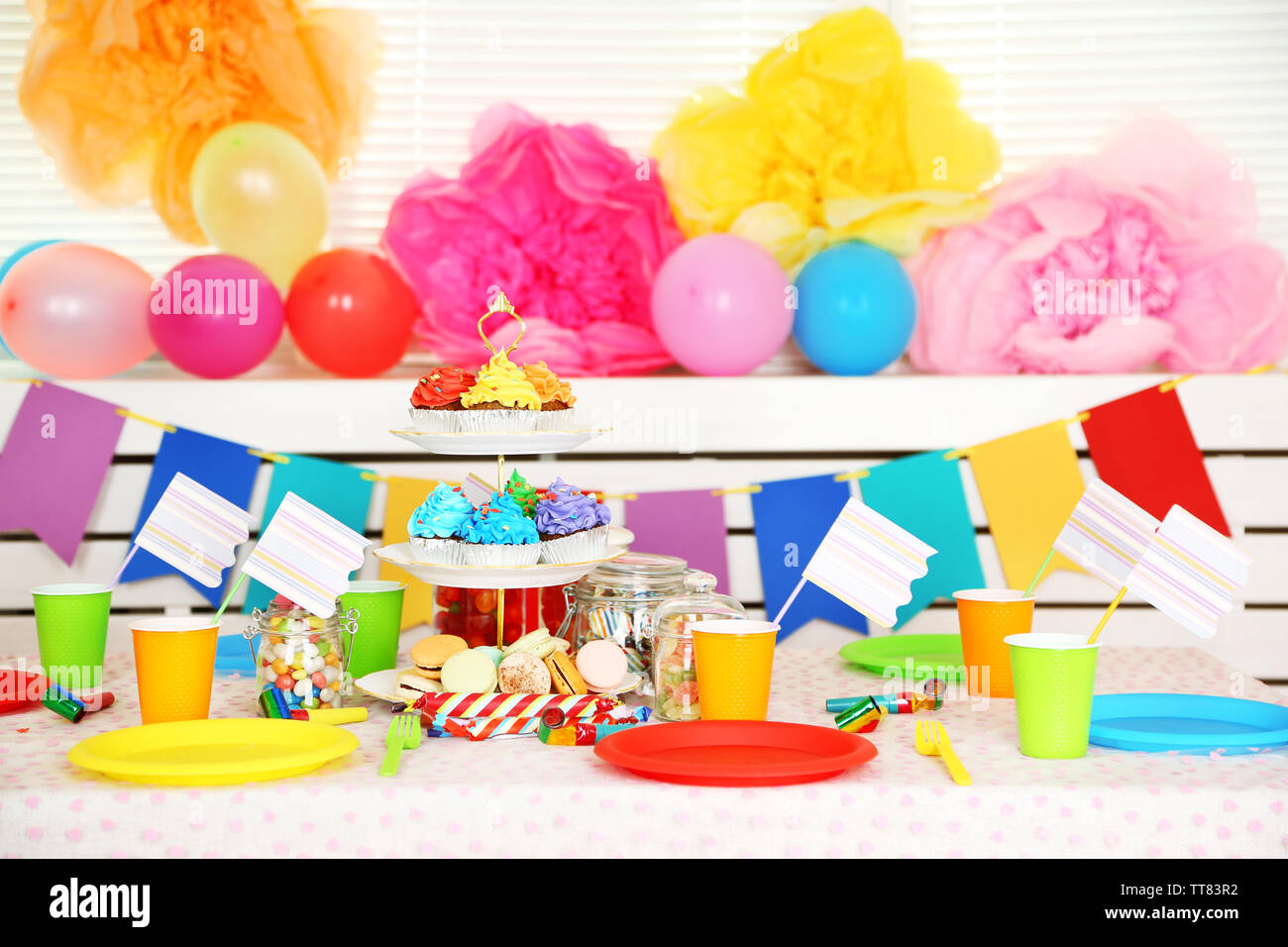 Prepared birthday table with sweets for children party Stock Photo - Alamy