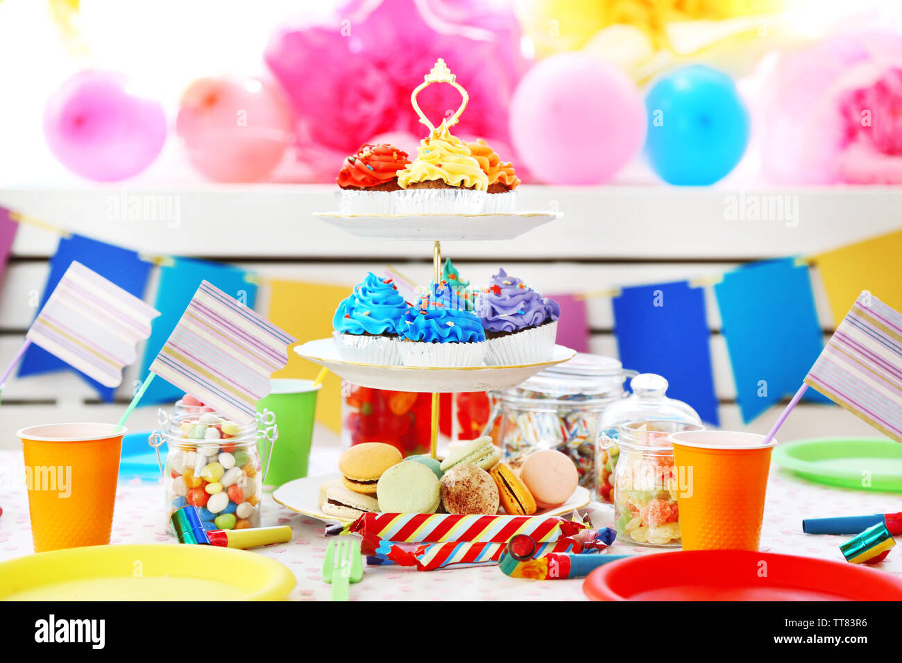 Prepared birthday table with sweets for children party Stock Photo - Alamy