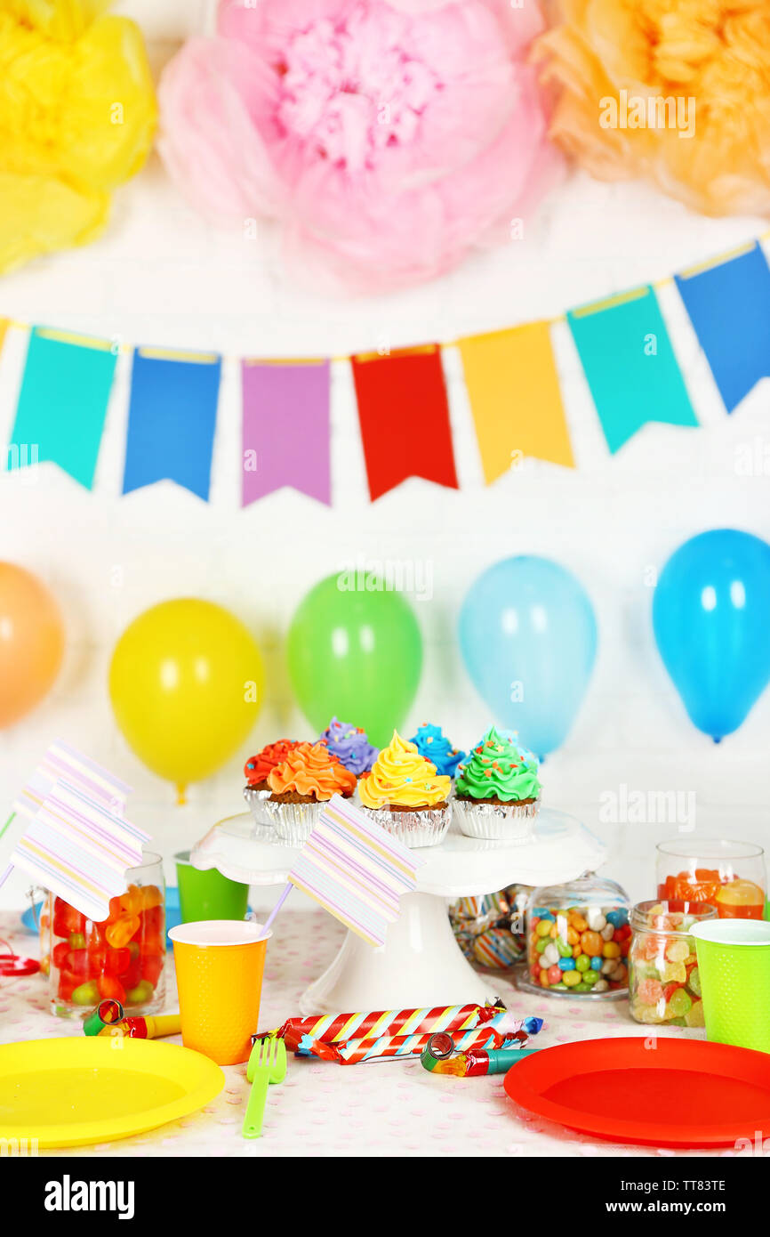 Prepared birthday table with sweets for children party Stock Photo - Alamy