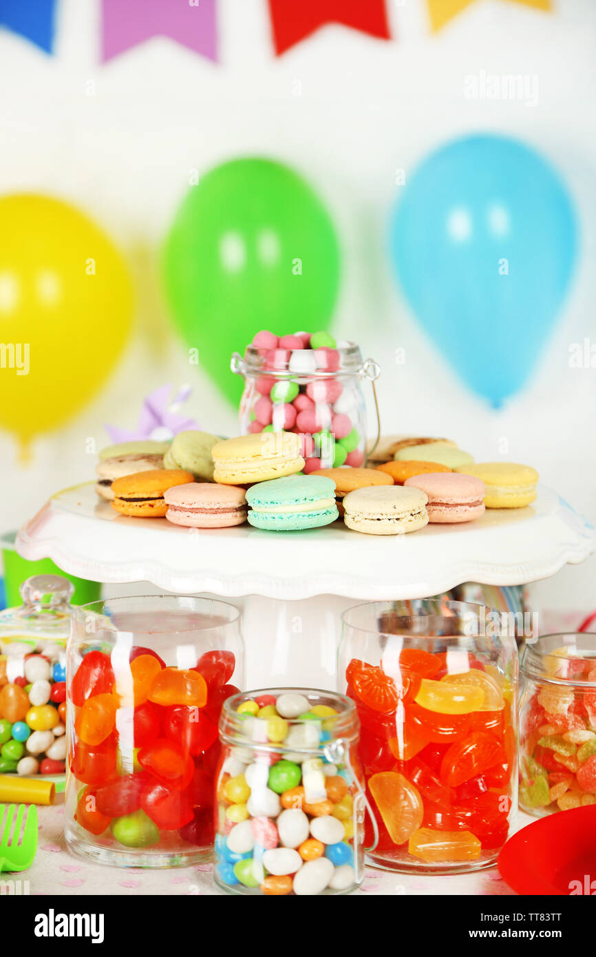 Prepared birthday table with sweets for children party Stock Photo - Alamy