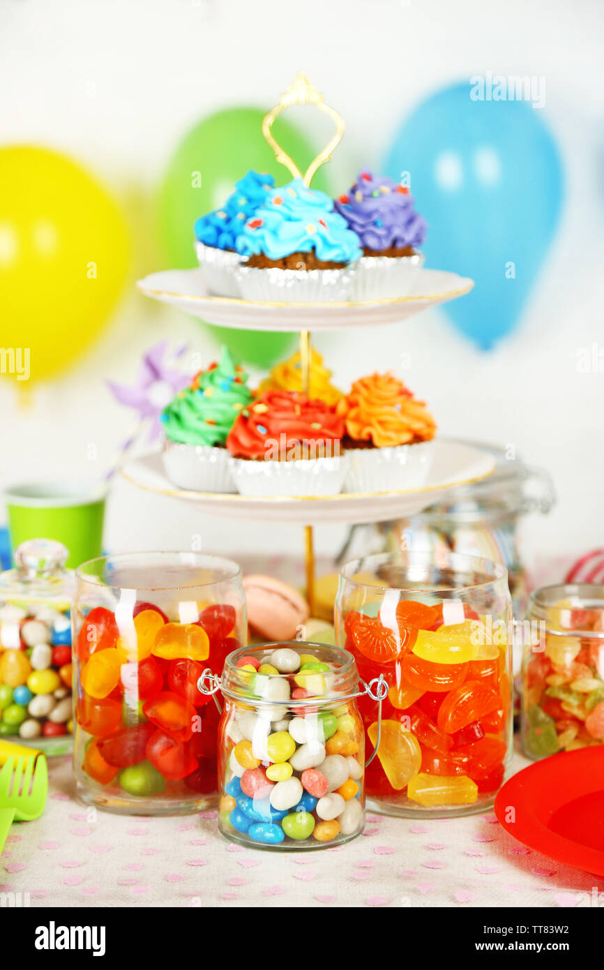 Prepared birthday table with sweets for children party Stock Photo - Alamy