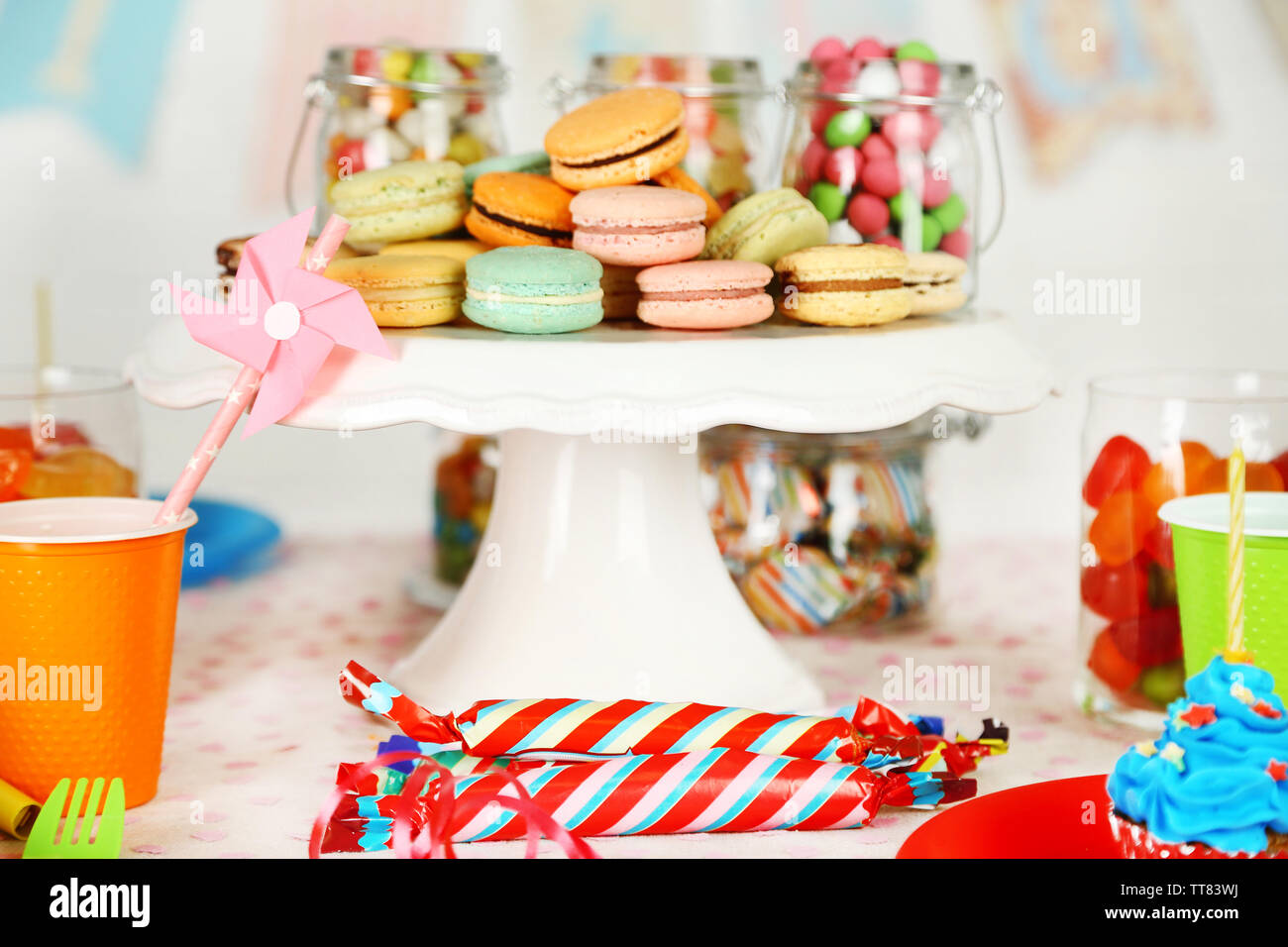 Prepared birthday table with sweets for children party Stock Photo - Alamy