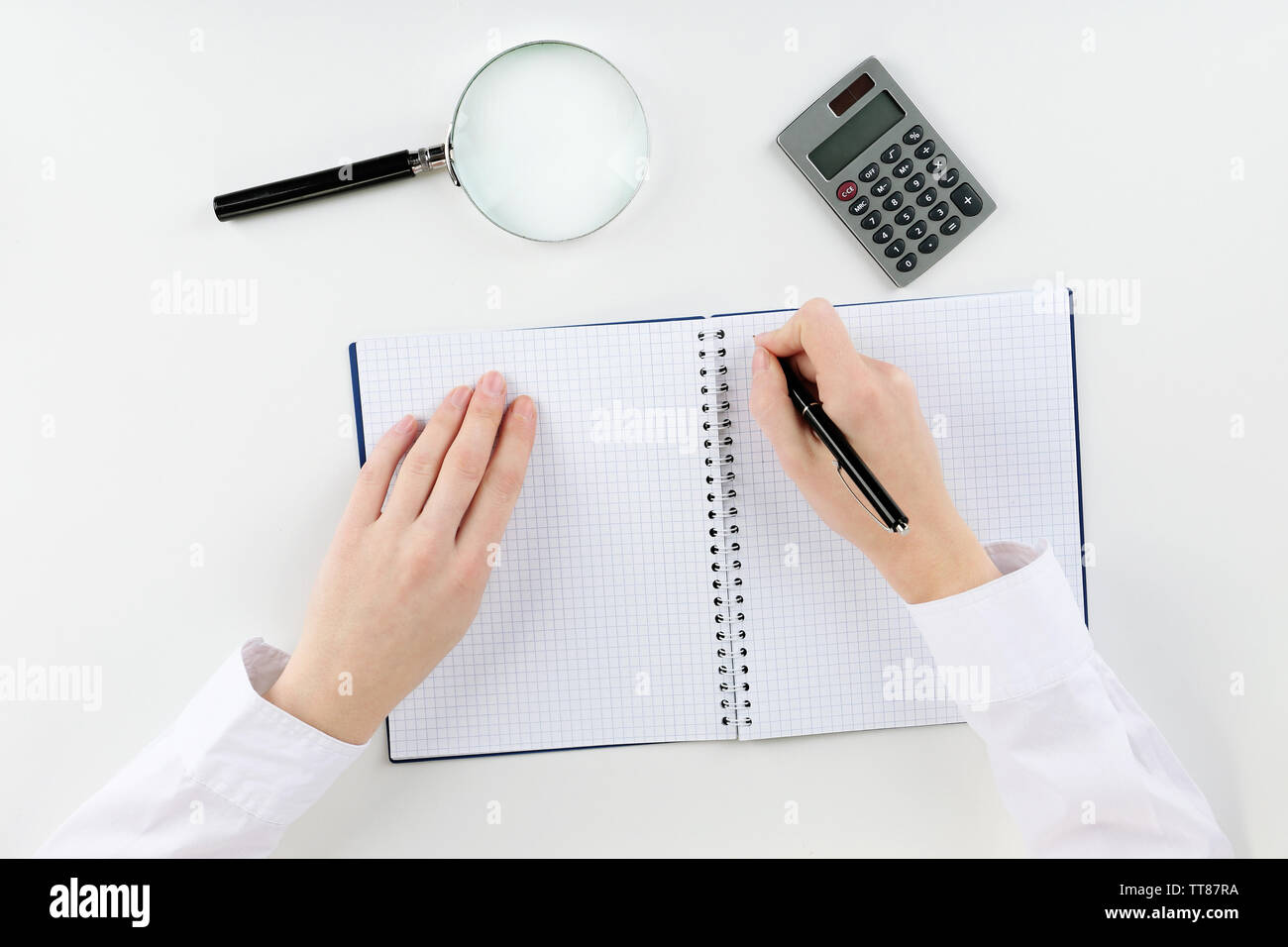 Hands working in the office with notebook, on white background Stock ...