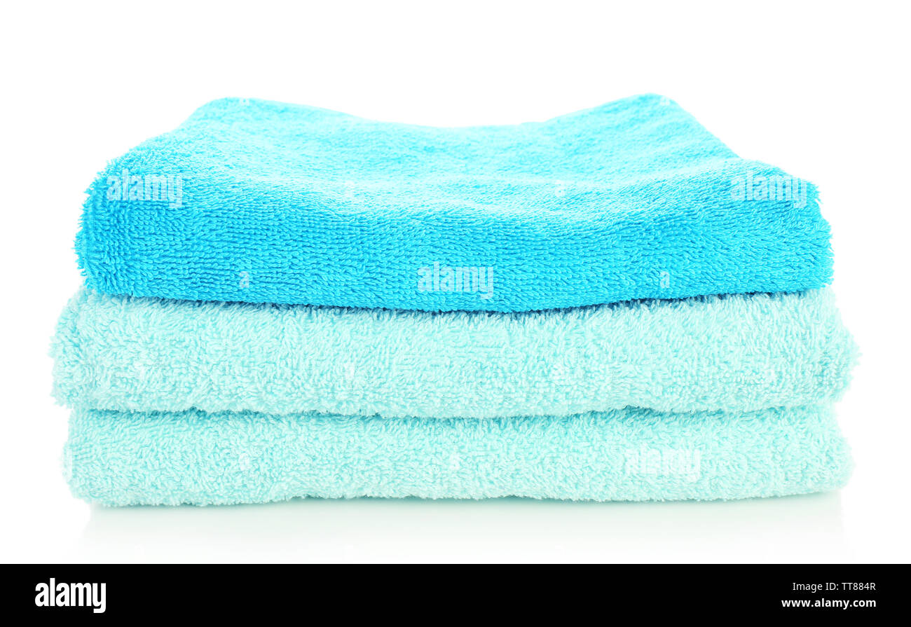 Stack of towels isolated on white Stock Photo - Alamy