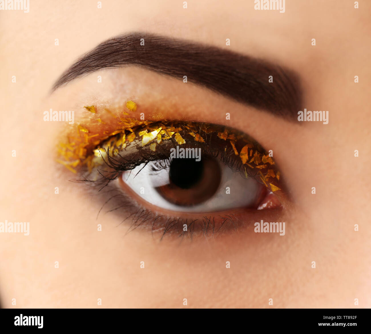 Female eye with fancy glitter makeup, macro view Stock Photo - Alamy