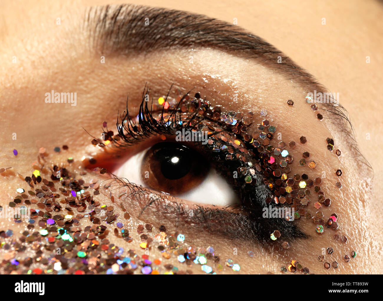 Female eye with fancy glitter makeup, macro view Stock Photo - Alamy