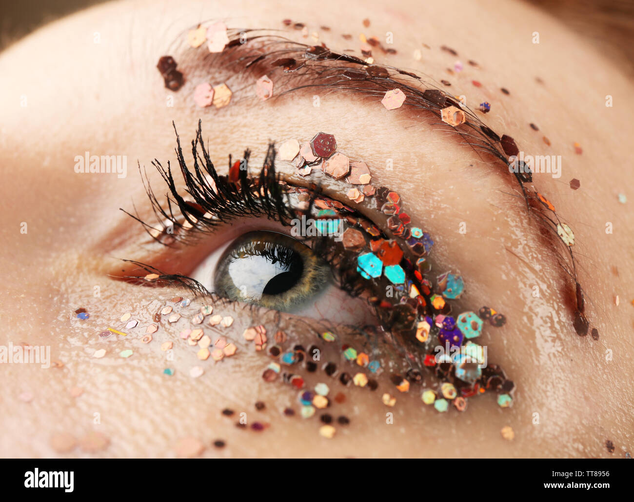 Female eye with fancy glitter makeup, macro view Stock Photo - Alamy