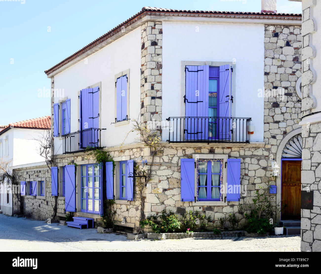 Old Houses view in historical Alacati Town. Alacati is popular tourist ...
