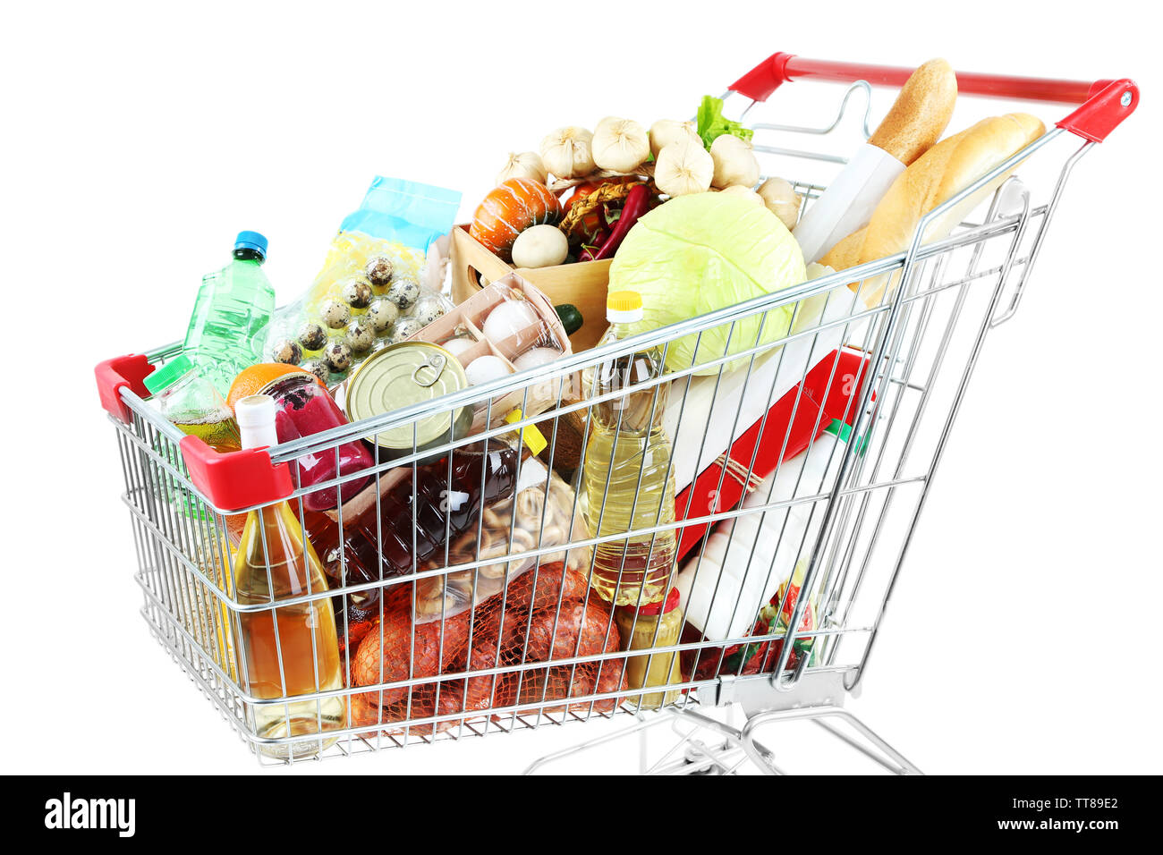 Shopping cart full with various groceries isolated on white Stock Photo ...