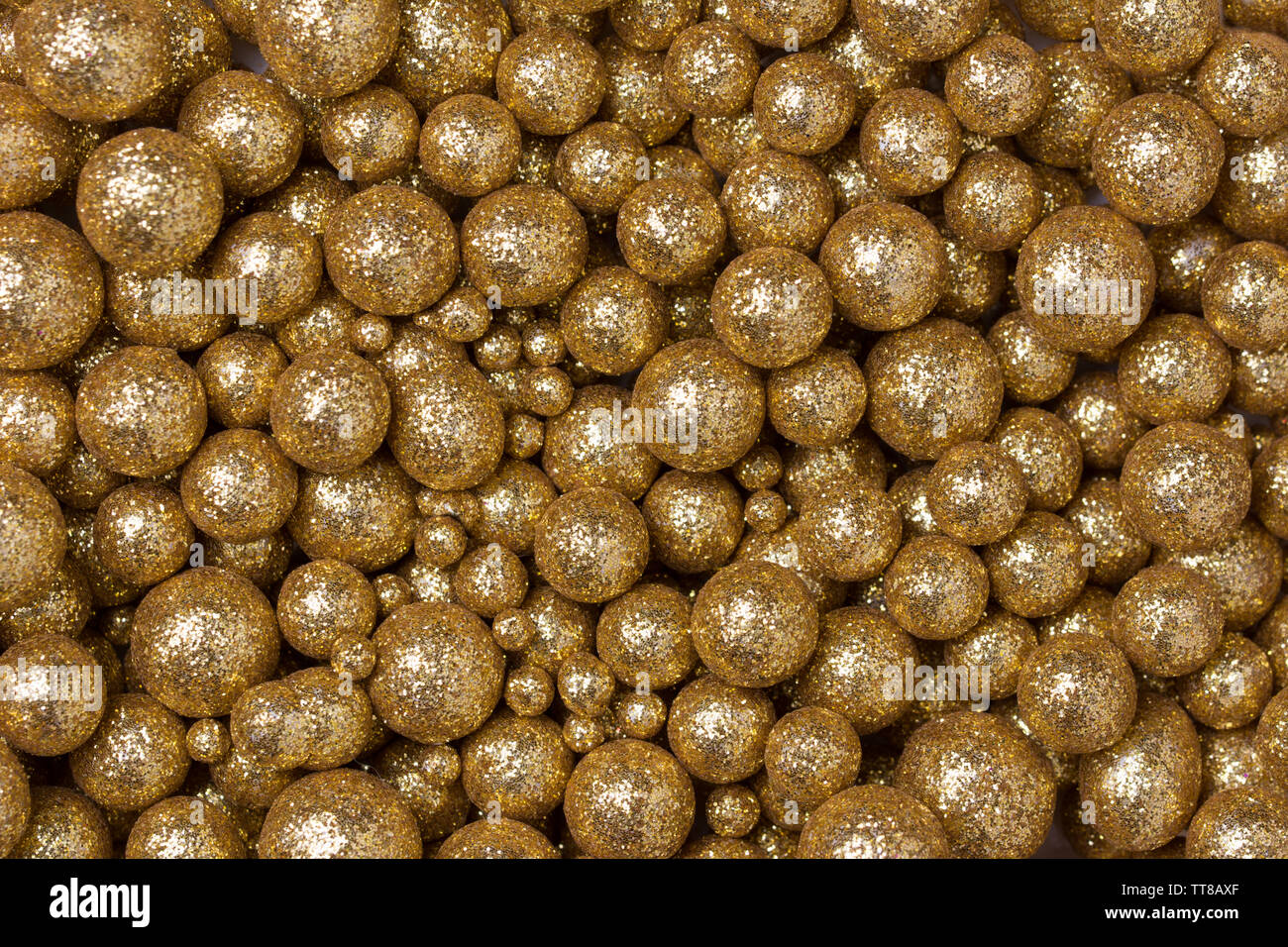 Christmas background with big and small golden glitter balls Stock ...
