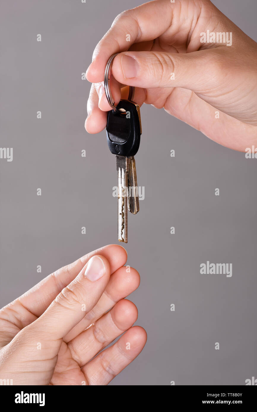 Hand holding bunch keys hi-res stock photography and images - Alamy