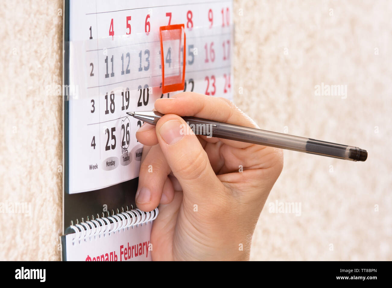 hand highlighting important date on calendar, closeup Stock Photo - Alamy
