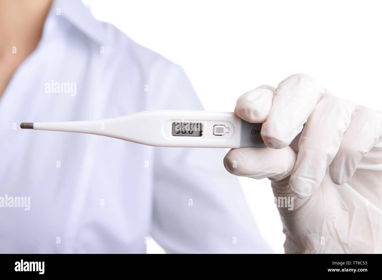 Doctor holding thermometer close up Stock Photo - Alamy