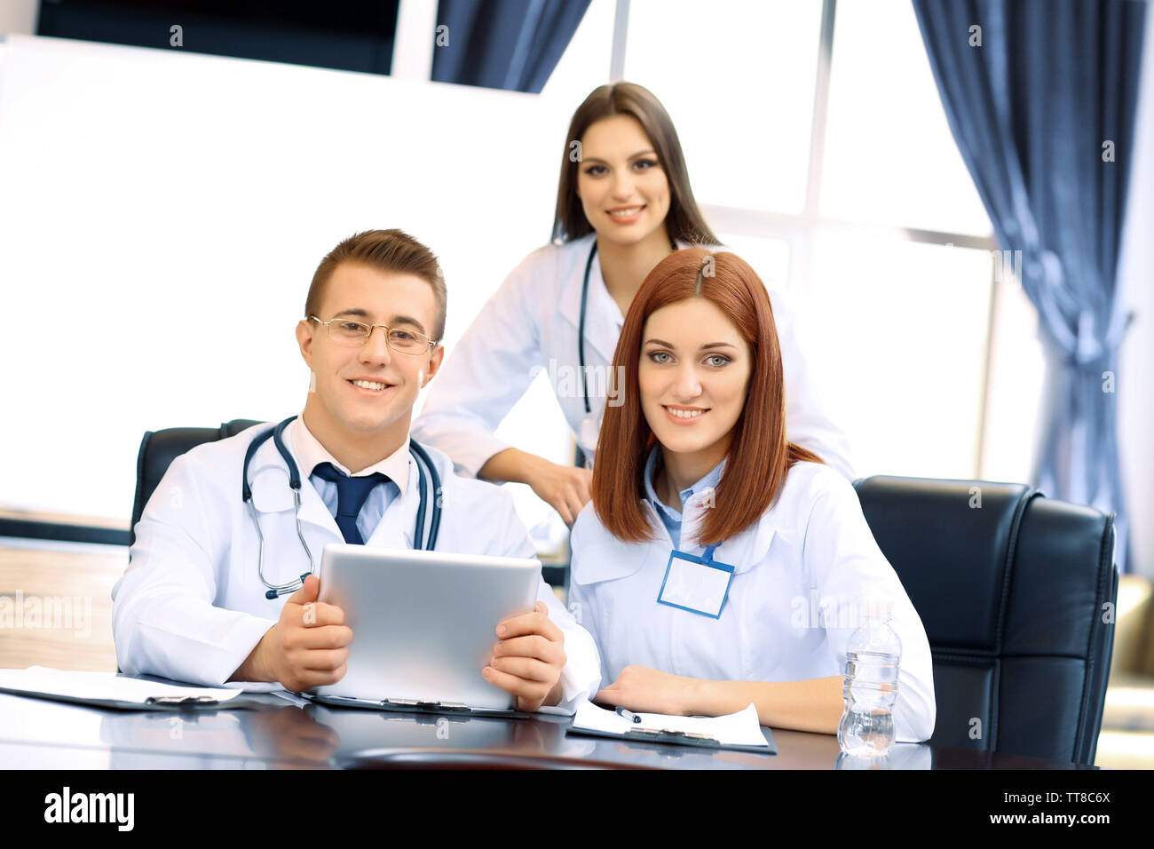 Medical workers working in conference room Stock Photo - Alamy