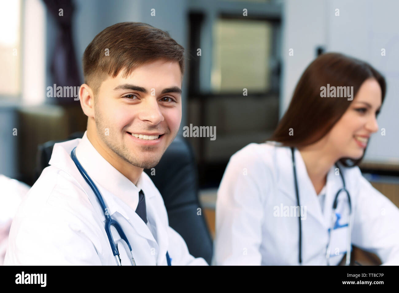 Medical workers working in conference room Stock Photo - Alamy