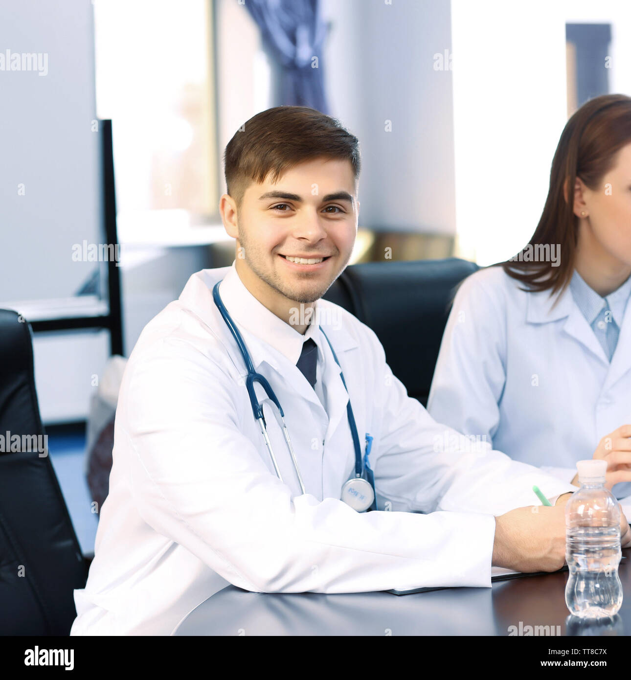 Medical workers working in conference room Stock Photo - Alamy